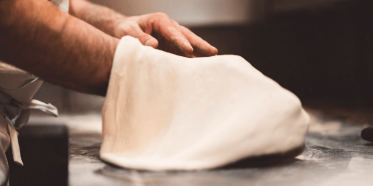 How to Stretch Pizza Dough in 6 Steps (Tips Included)