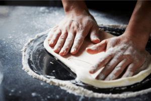 How to Stretch Pizza Dough in 6 Steps (Tips Included)
